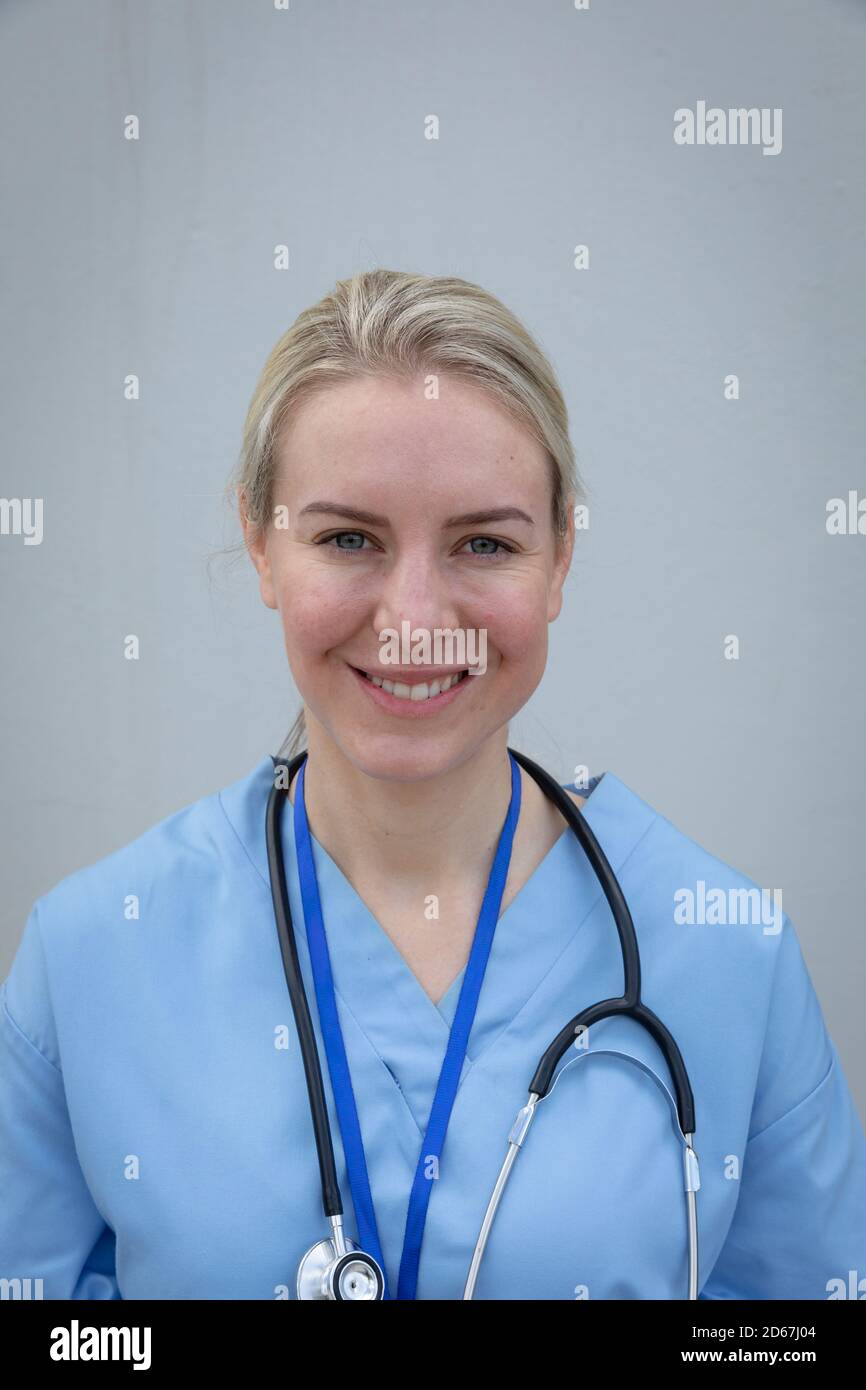 Professional smiling hi-res stock photography and images - Alamy