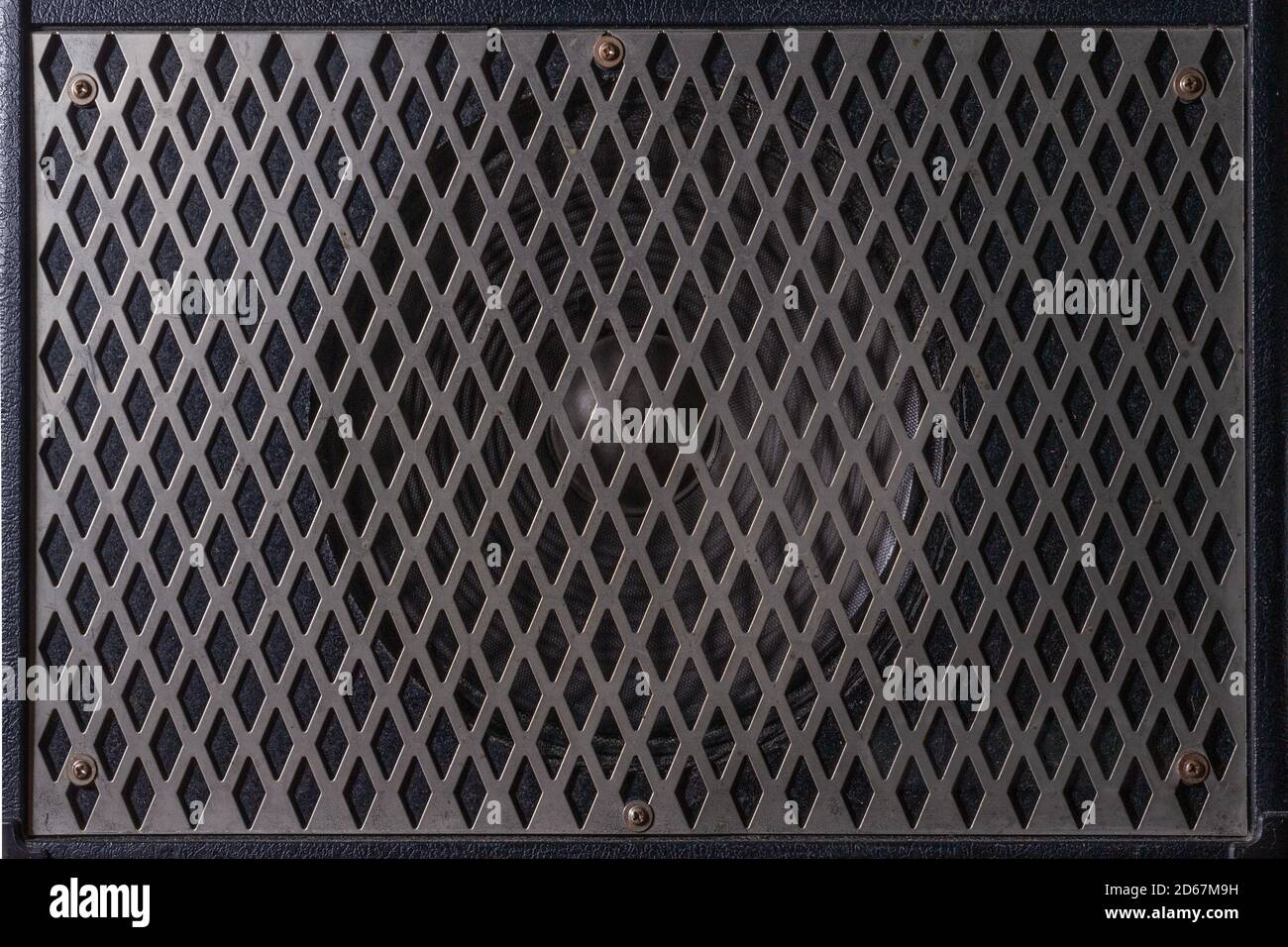 Closeup of the metallic grid pattern of a guitar amplifier Stock Photo ...