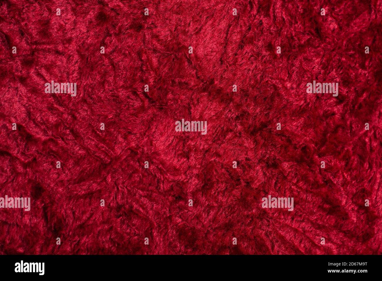 Closeup of red cherry carpet surface, texture for wallpaper or ...