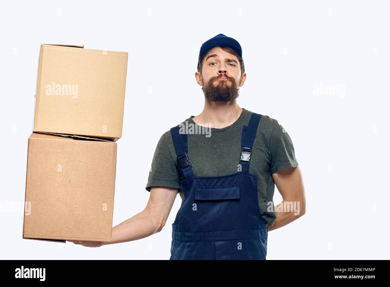 Working man with boxes in hands delivery service work lifestyle Stock ...