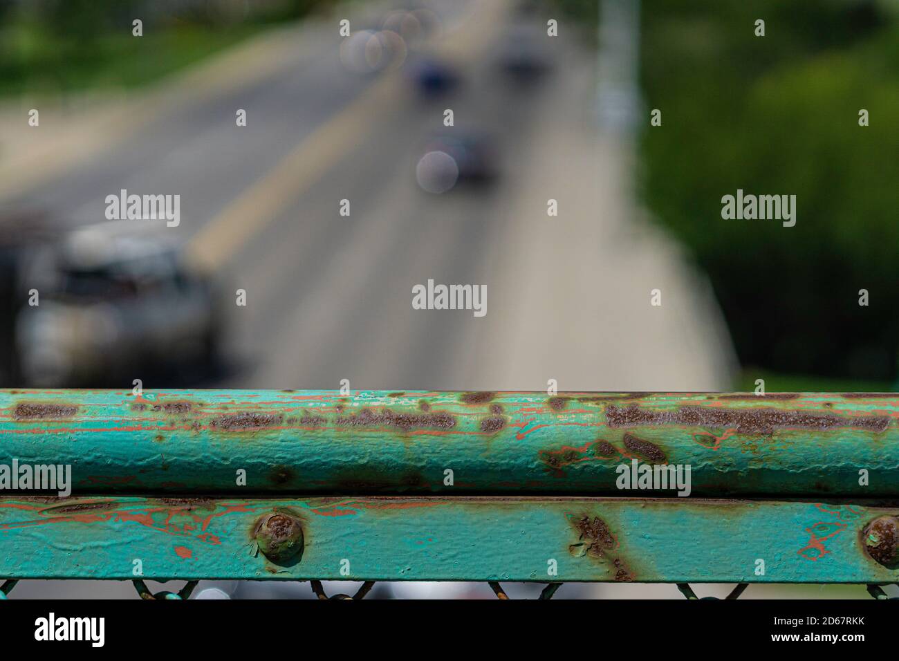 Rusted bridge overpass railings over a road Stock Photo - Alamy