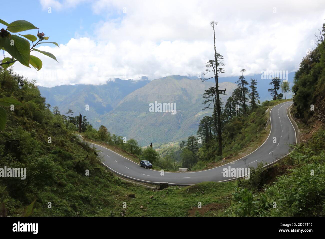 Beautiful road at Pelela in Bhutan with amazing background Stock Photo ...