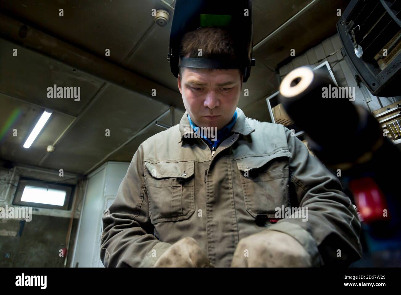 Close-up portrait of a welder in the workplace Stock Photo - Alamy