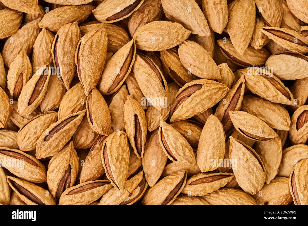 food background, texture of almond nuts closeup Stock Photo - Alamy