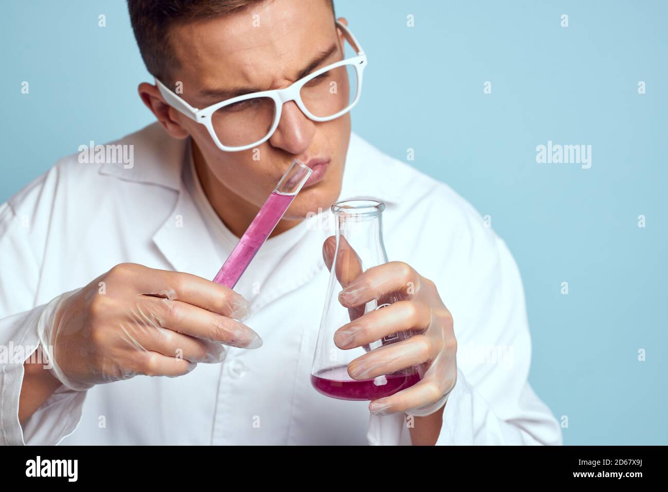 man holding flasks colorful liquid chemical laboratory model wearing ...