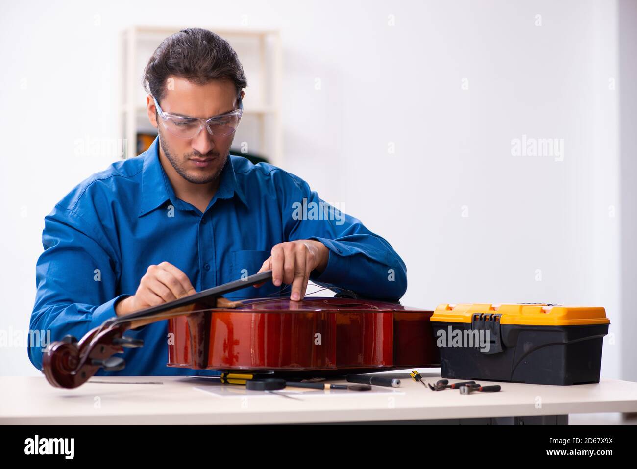 Cello repair hi-res stock photography and images - Alamy