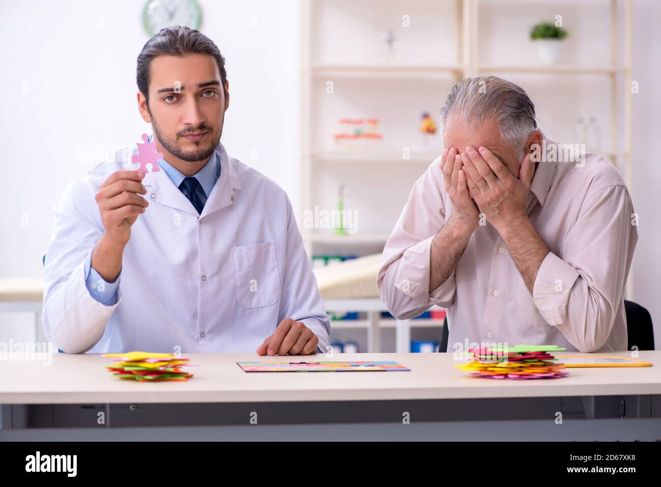 Doctor and patient suffering from the Alzheimer disease Stock Photo - Alamy