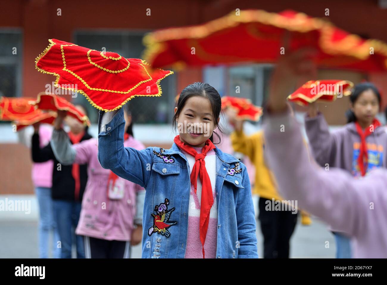 Xiangfan, China. 14th Oct, 2020. Children are playing the Chinese ...
