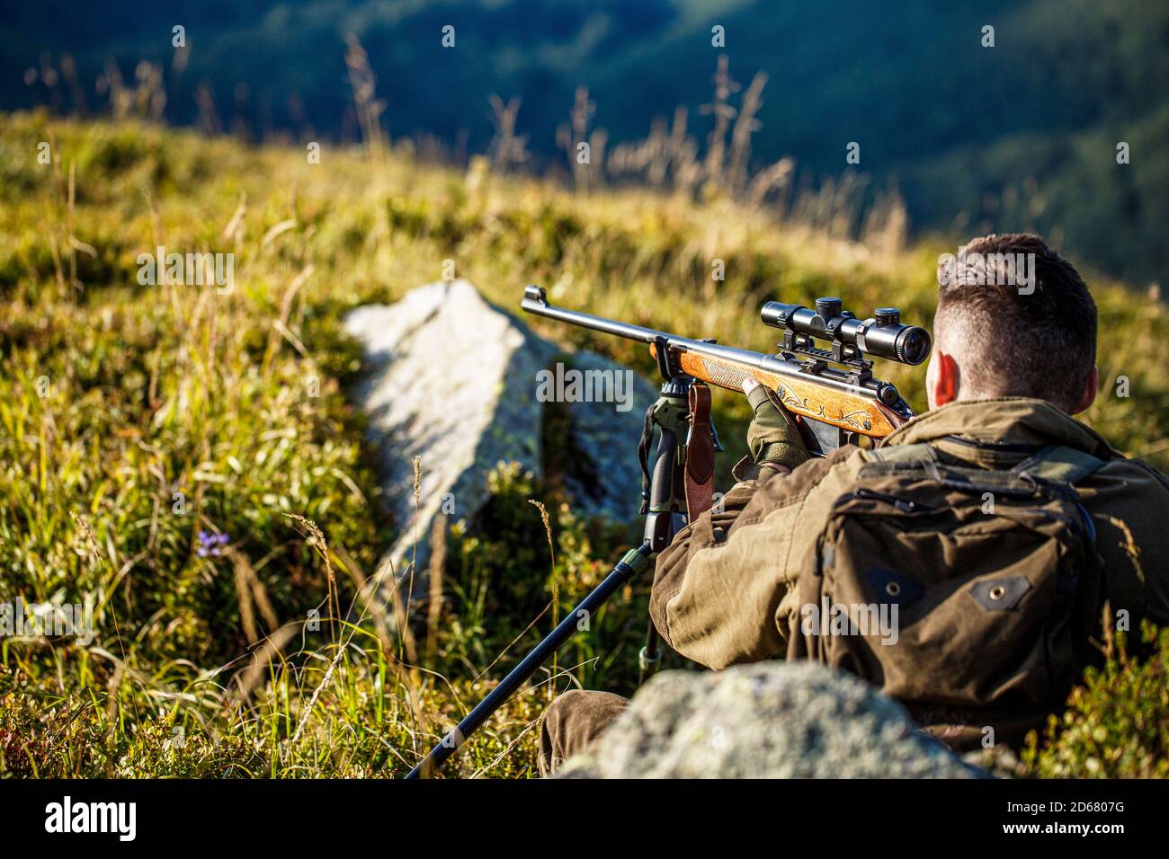 Hunting period. Male with a gun. Close up. Hunter with hunting gun and ...