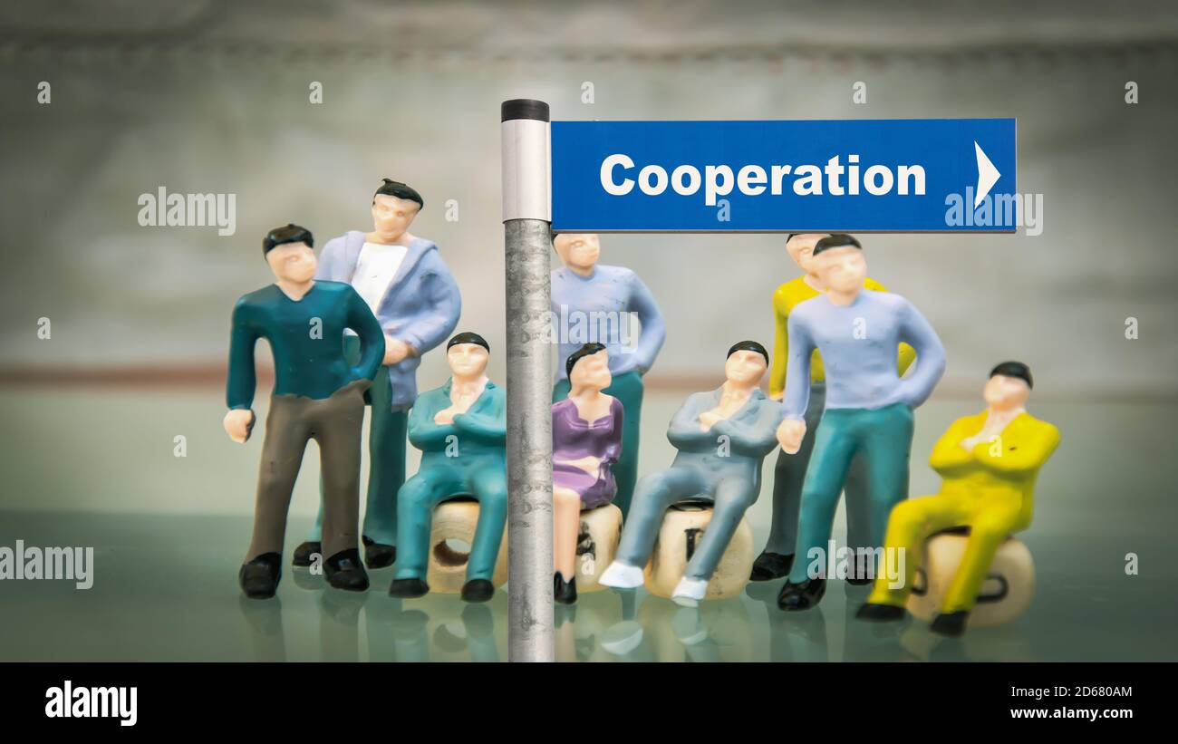 Street Sign the Direction Way to Cooperation Stock Photo - Alamy