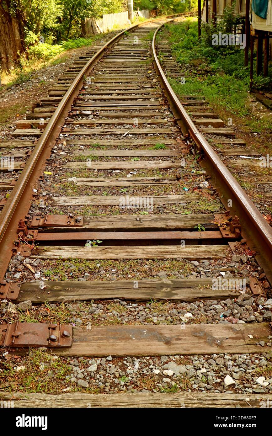 vertical image of empty railroad tracks in the countryside Stock Photo ...
