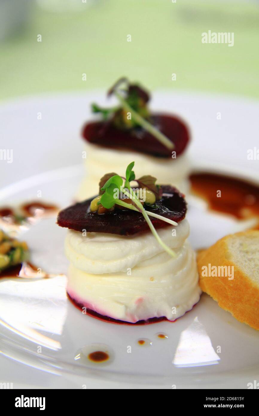 red root and goat cheese as gourmet food Stock Photo - Alamy