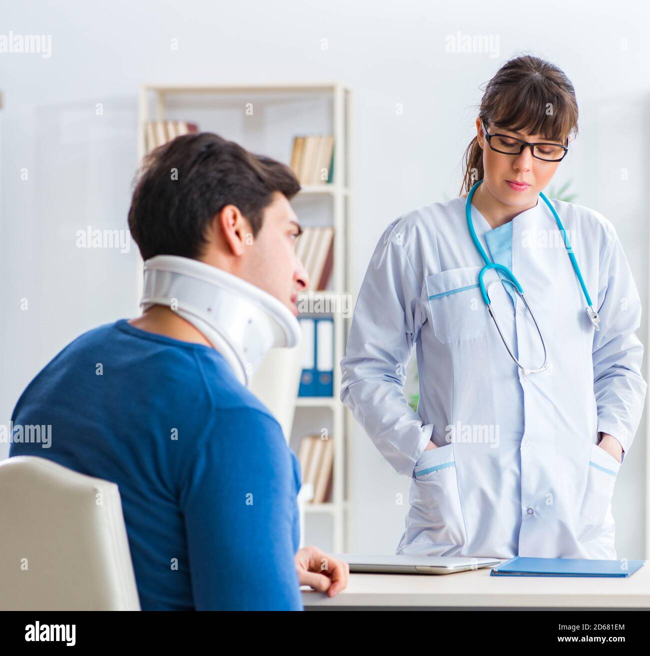 The doctor is explaining to patient with neck injury Stock Photo - Alamy
