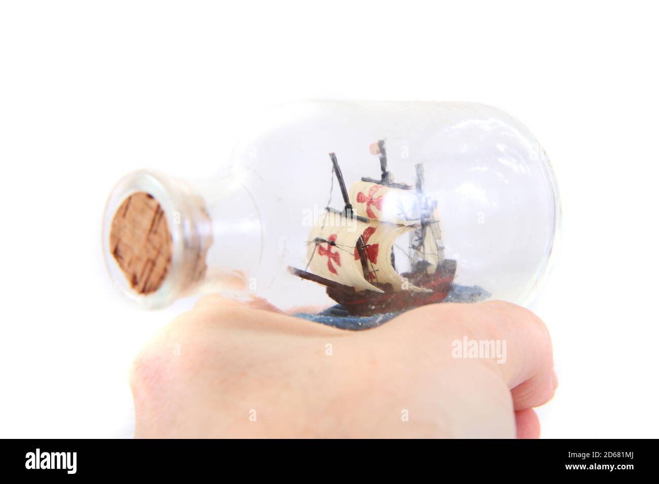 small ship in human hand isolated on the white background Stock Photo ...