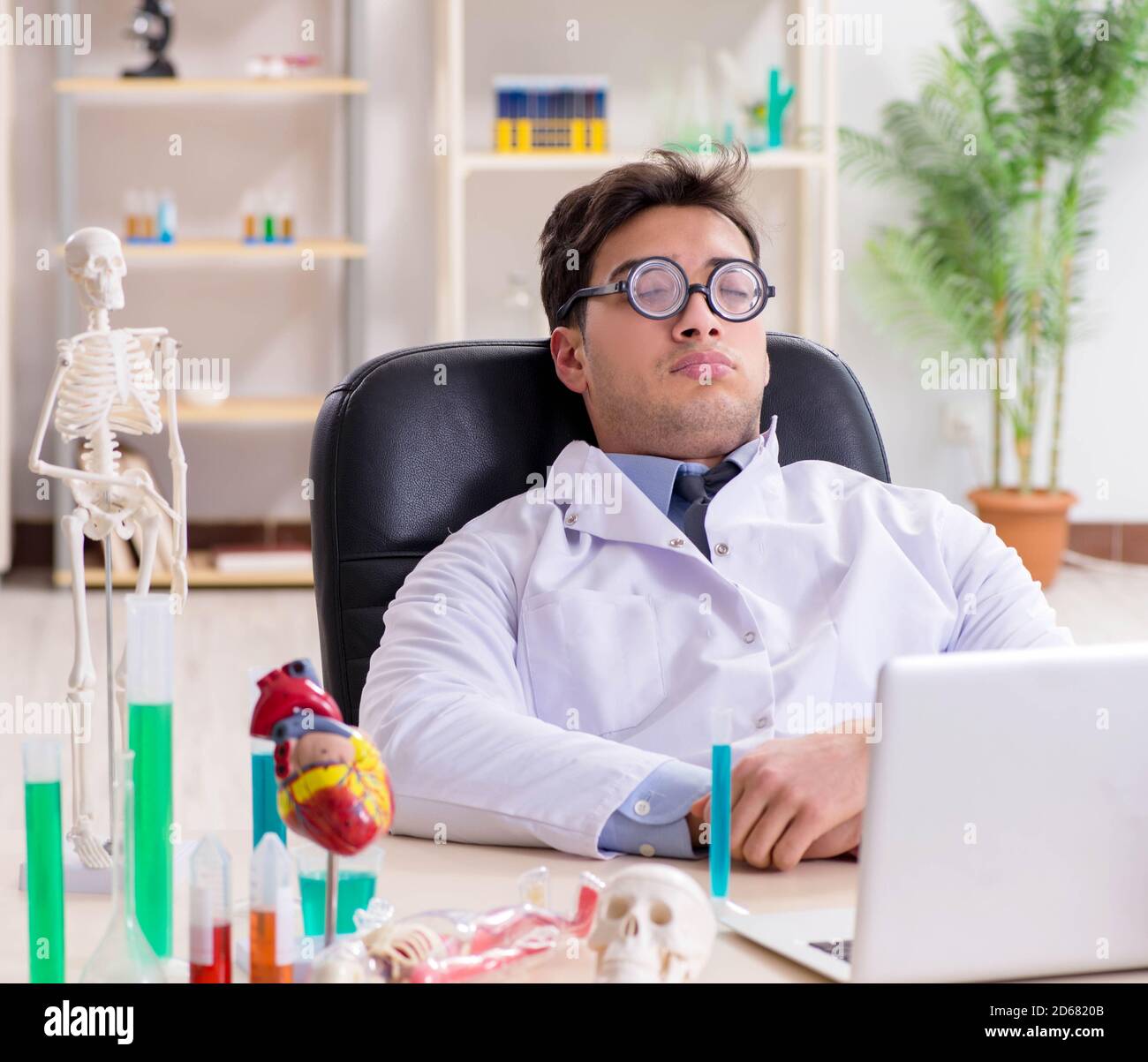 The funny doctor having fun in hospital lab Stock Photo - Alamy