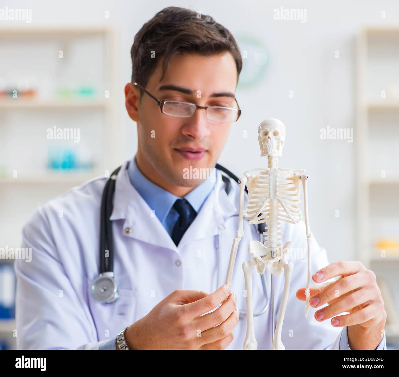 The doctor student studying the bones of skeleton Stock Photo - Alamy