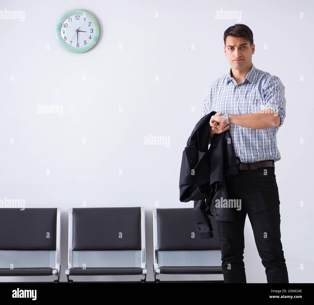 The man nervously impatiently waiting in the lobby Stock Photo - Alamy