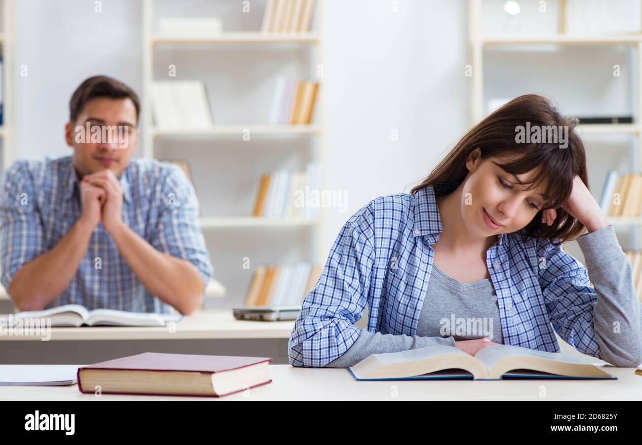 The students sitting and studying in classroom college Stock Photo - Alamy