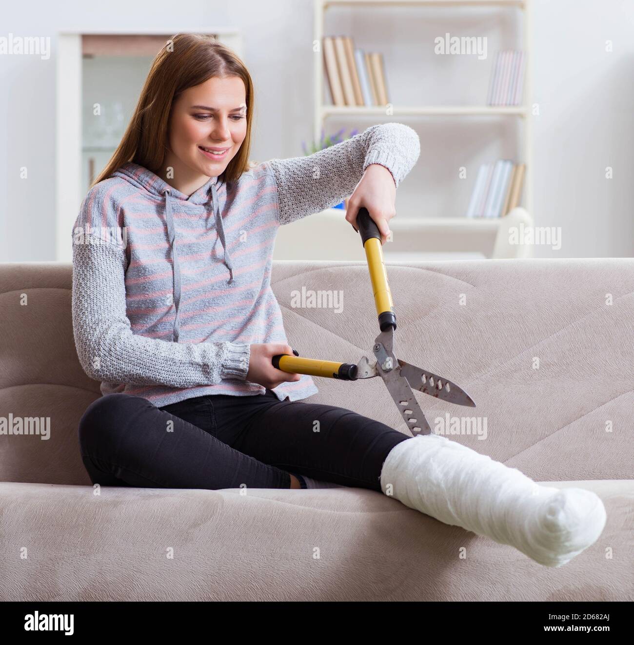 The young woman with broken leg at home Stock Photo - Alamy