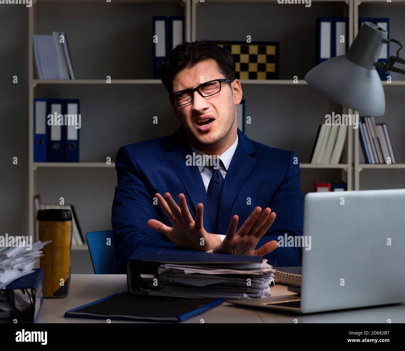 The employee working late to finish important deliverable task Stock ...