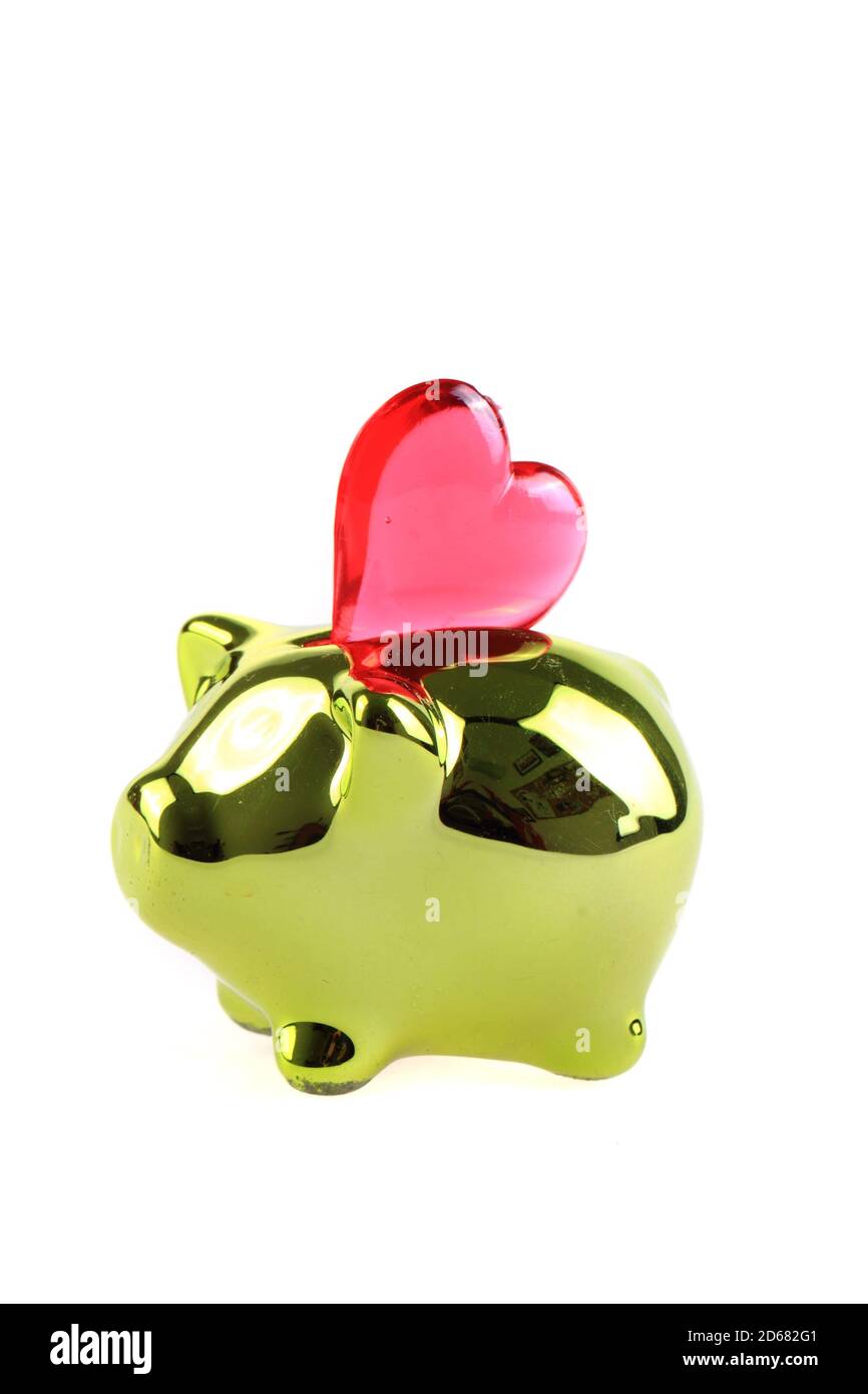 coin pig with heart isolated on white background Stock Photo - Alamy