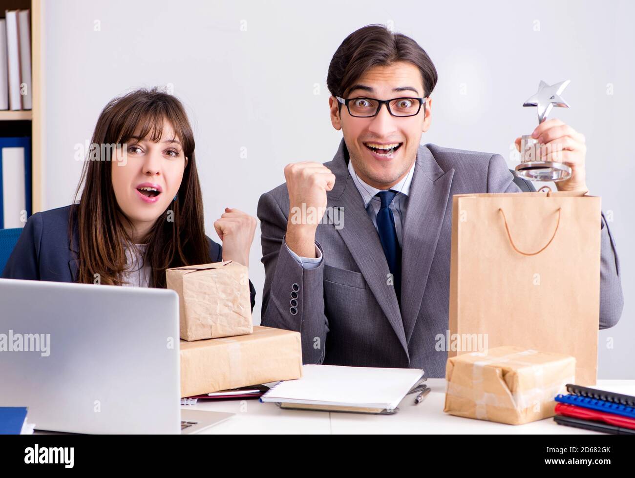 The business people receiving new mail and parcels Stock Photo - Alamy