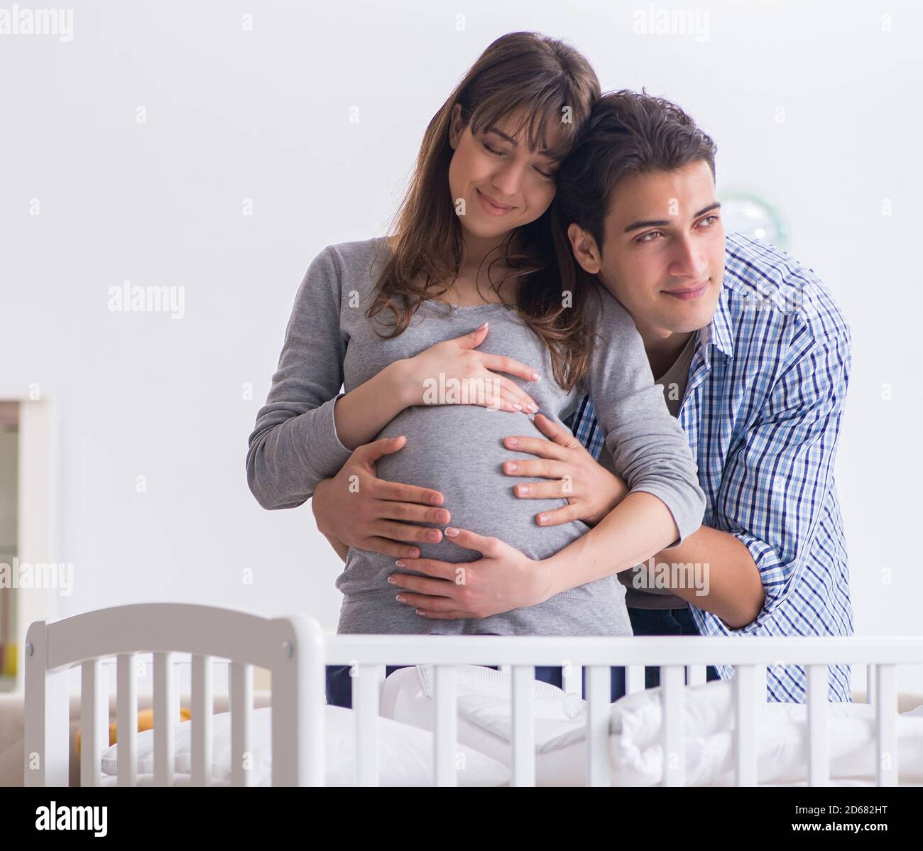 The young parents expecting their first baby Stock Photo - Alamy