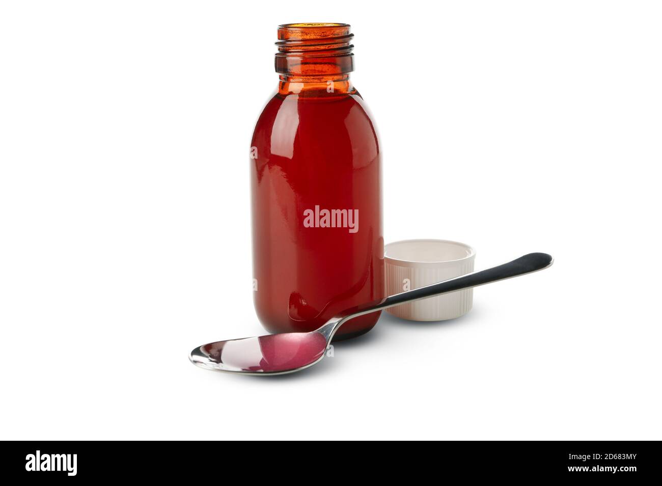 Medicine bottle and spoon with syrup isolated on white background Stock ...
