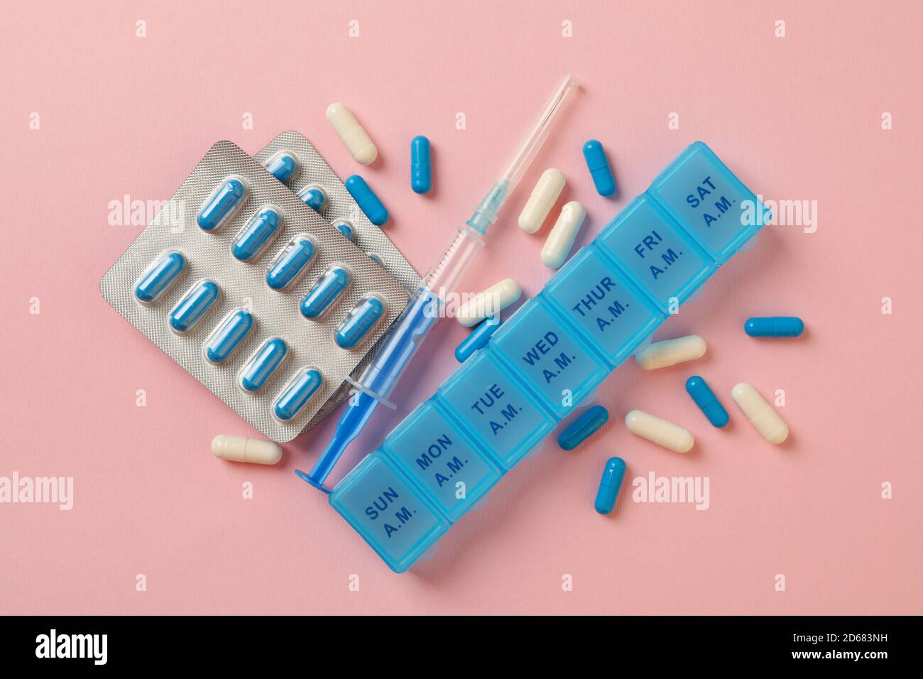 On table blue pill boxes hi-res stock photography and images - Alamy