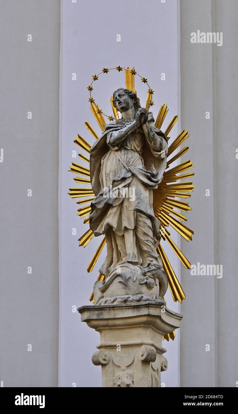 Religious baroque statue in front of church of Ignatius of Loyola in ...