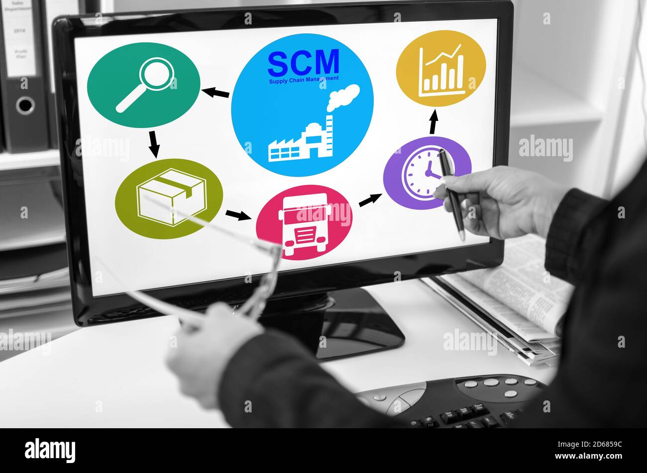 Businesswoman showing scm concept on a computer screen Stock Photo - Alamy