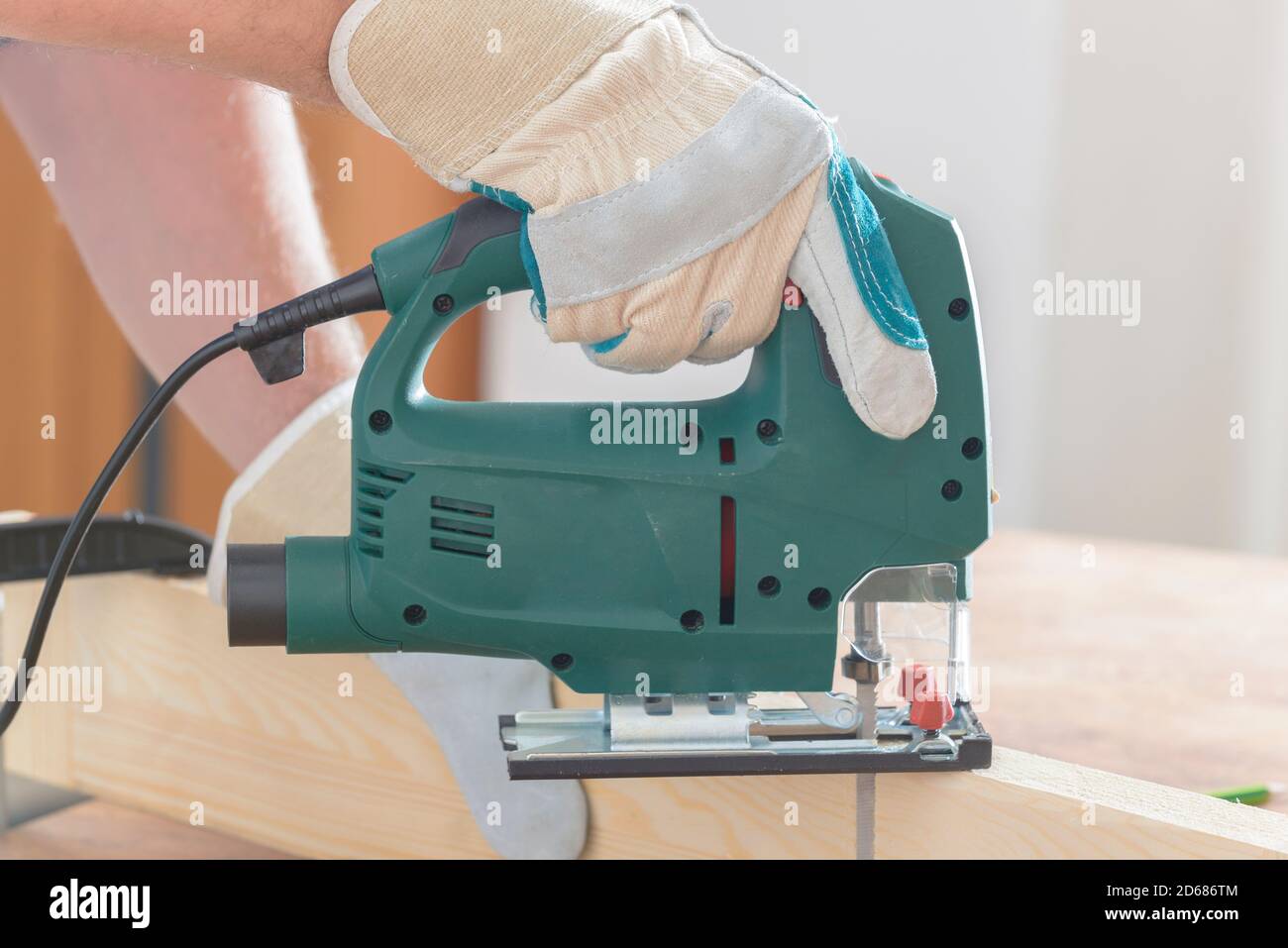 Using a jigsaw hi-res stock photography and images - Alamy