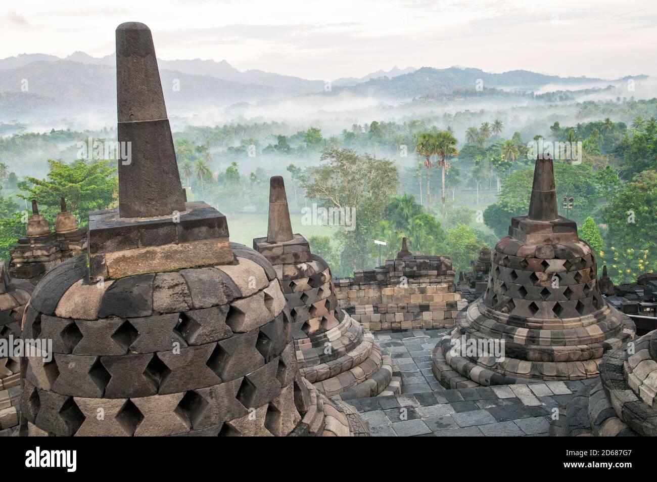 Morning mist at Borobudur temple on Java Island, Indonesia Stock Photo ...
