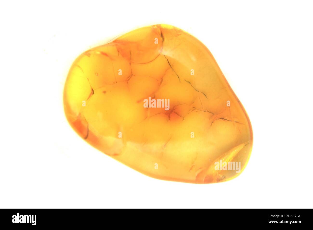 yellow amber gem isolated on the white background Stock Photo - Alamy