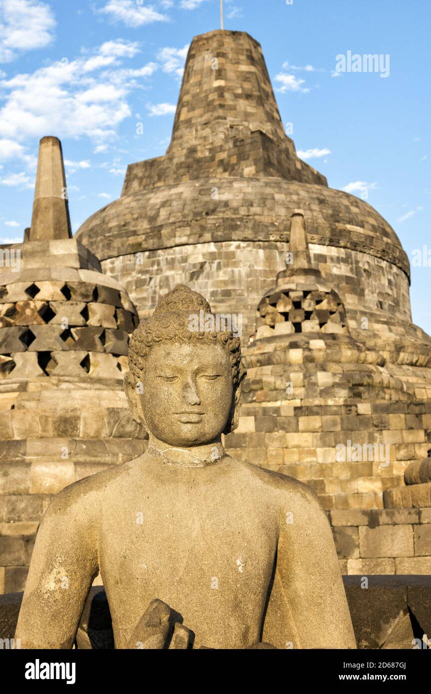 Buddha statue and stupas at Borobudur temple, Java Island, Indonesia ...