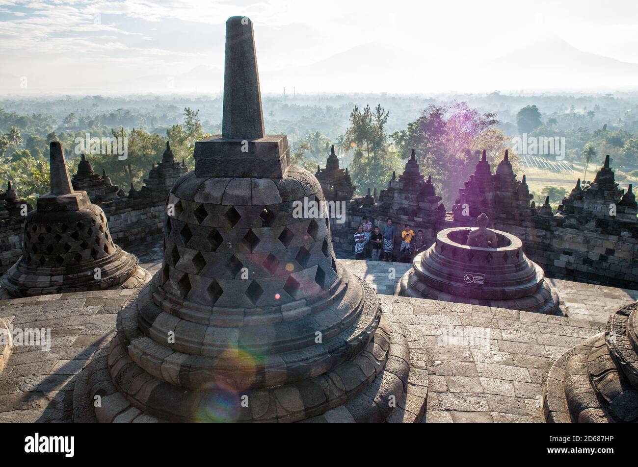 Sun on the stupas of Borobudur temple, Java Island, Indonesia Stock ...