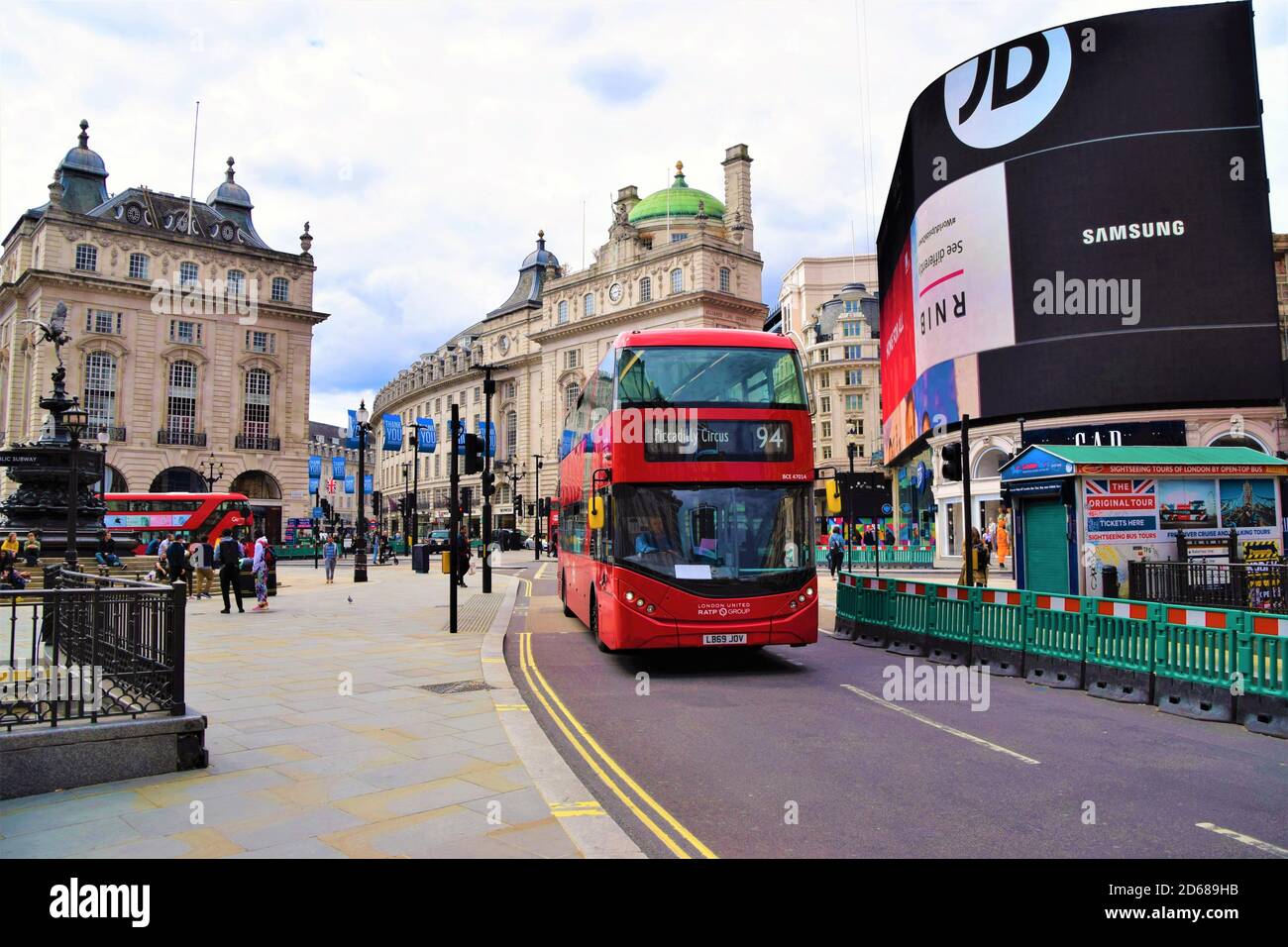 Piccadilly Circus daytime view with double-decker bus, London, UK Stock ...