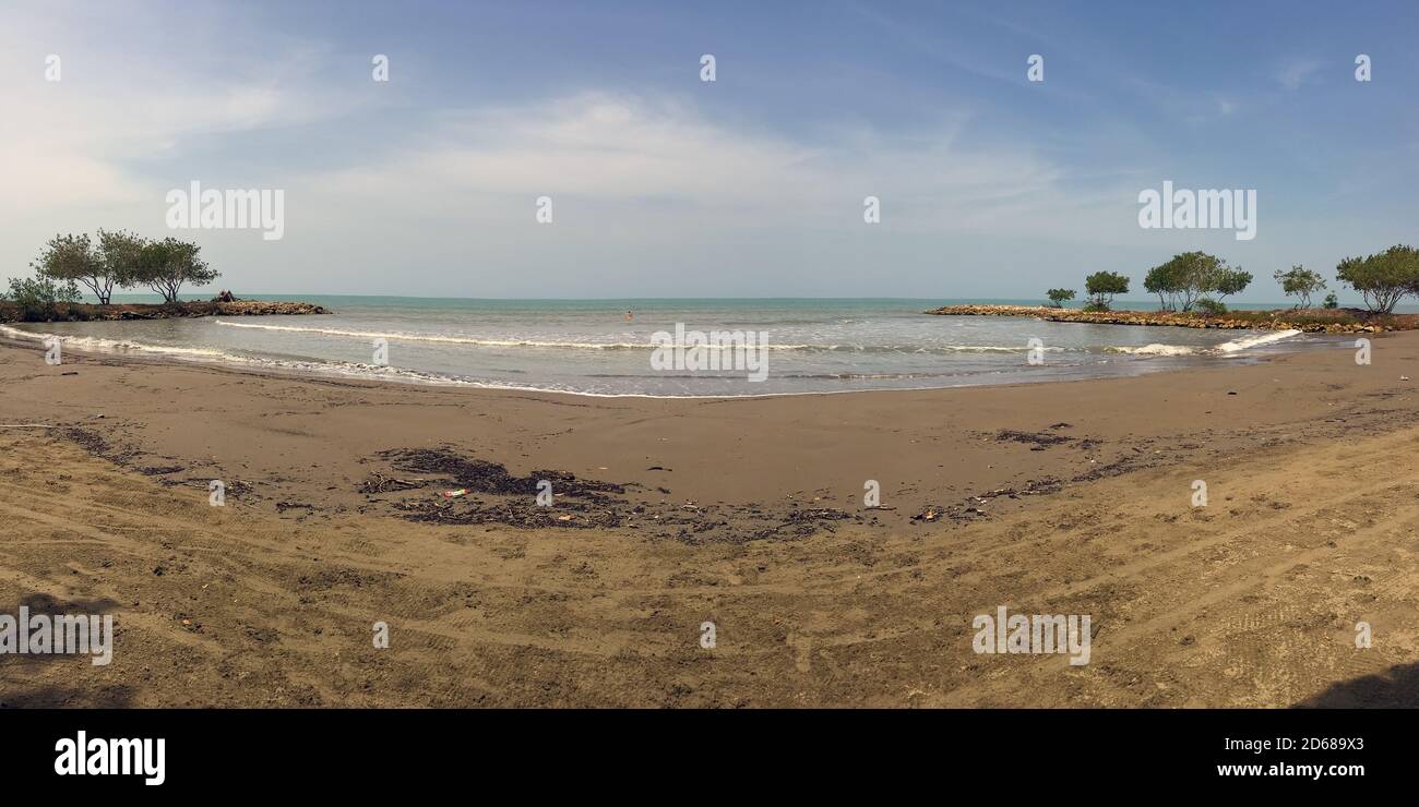 Dirty Beach with some Debris in the Sand Stock Photo - Alamy