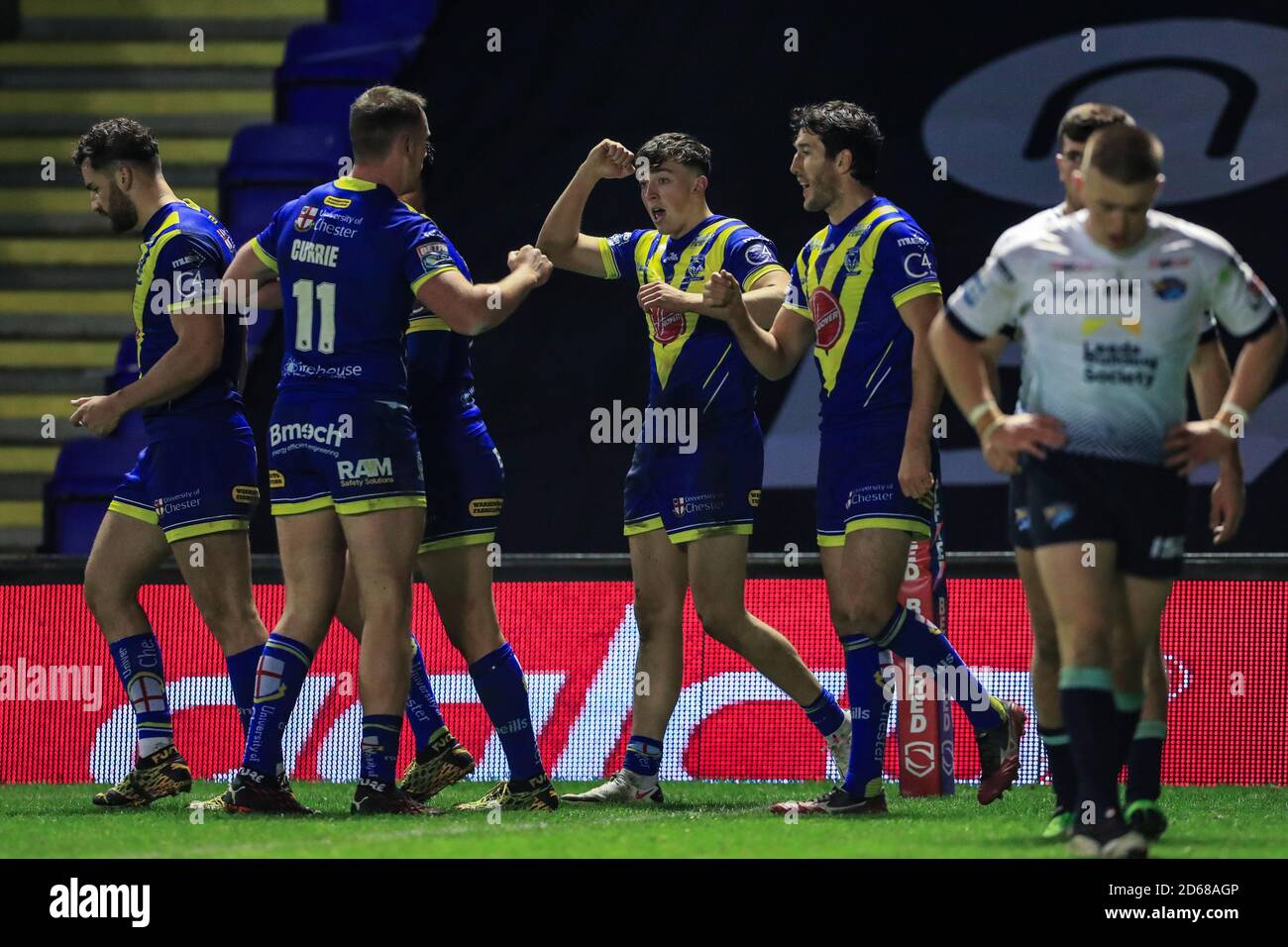 Matty Ashton (26) of Warrington Wolves celebrates scoring his try Stock ...