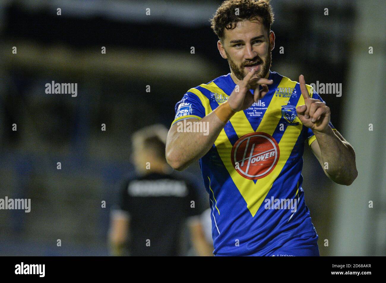 Toby King (4) of Warrington Wolves celebrates scoring opening try Stock ...