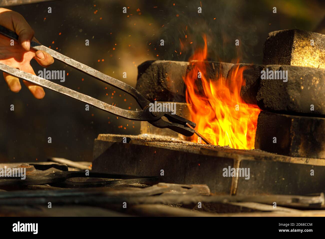 a burning forge made of bricks in nature Stock Photo - Alamy