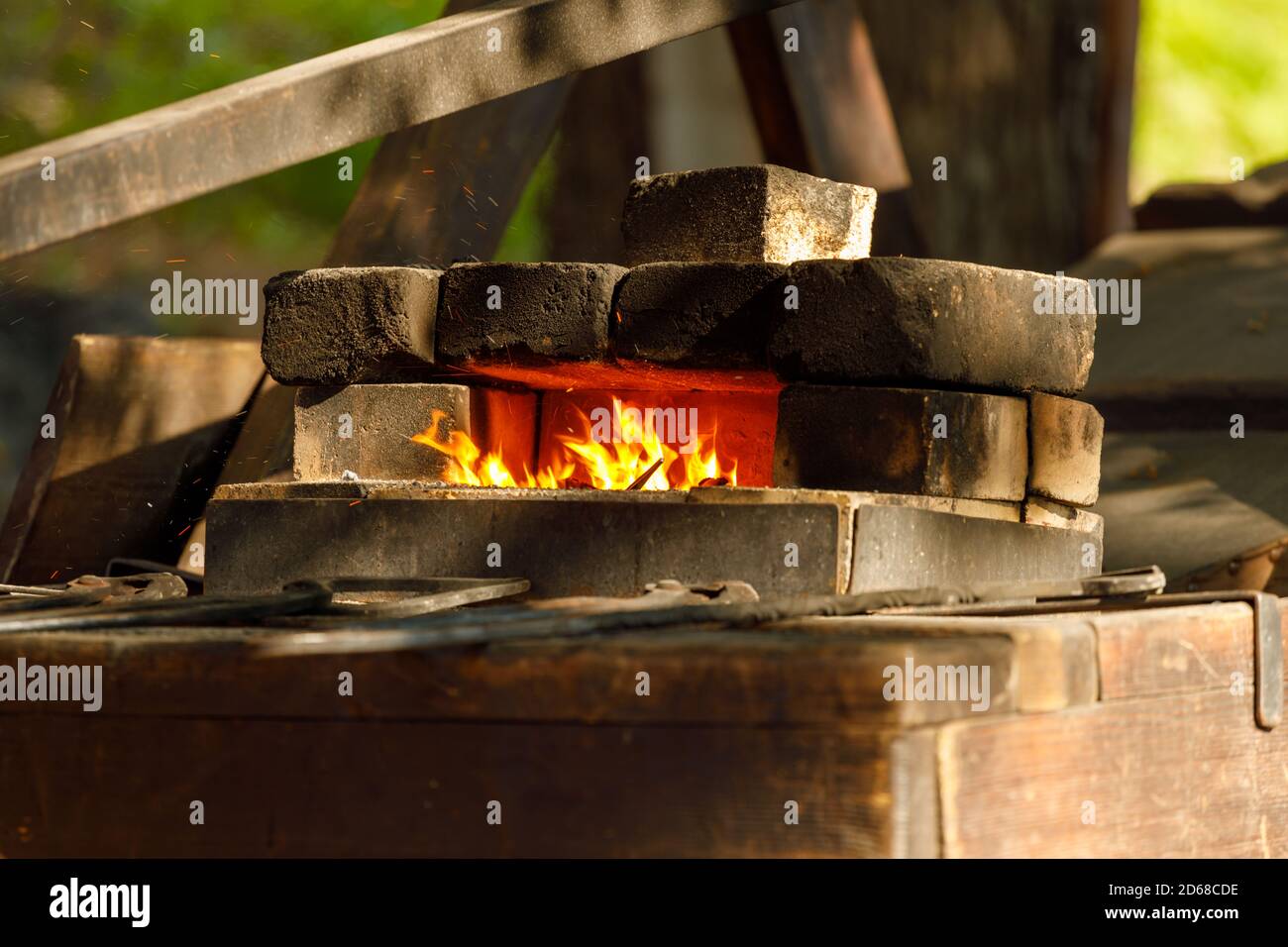 a burning forge made of bricks in nature Stock Photo - Alamy