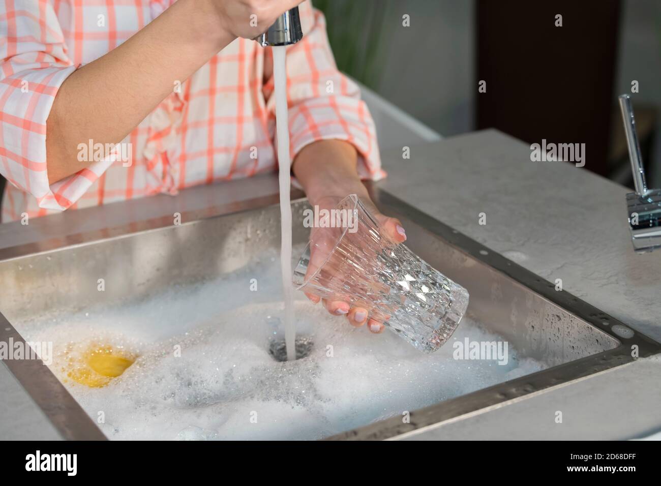 Filling glass water from sink hi-res stock photography and images - Alamy