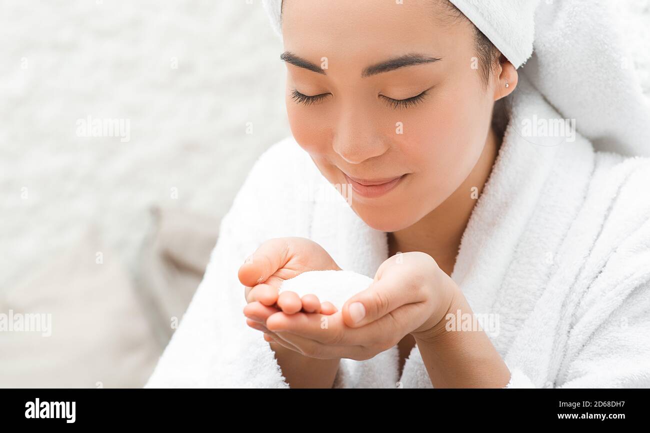 Beautiful woman inhales salt air, halotherapy. Salt air treatment at ...