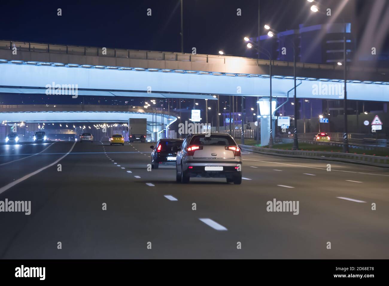 cars move on the night highway Stock Photo - Alamy