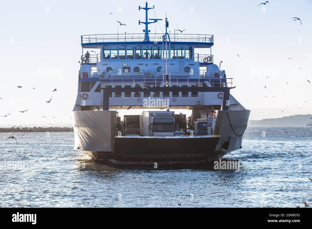 loaded ferry loaded with carsnmoves to another side of a sea Stock ...