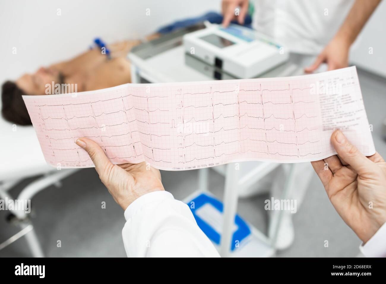 Cardiogram test, close-up of ECG report over mature male patient Stock ...