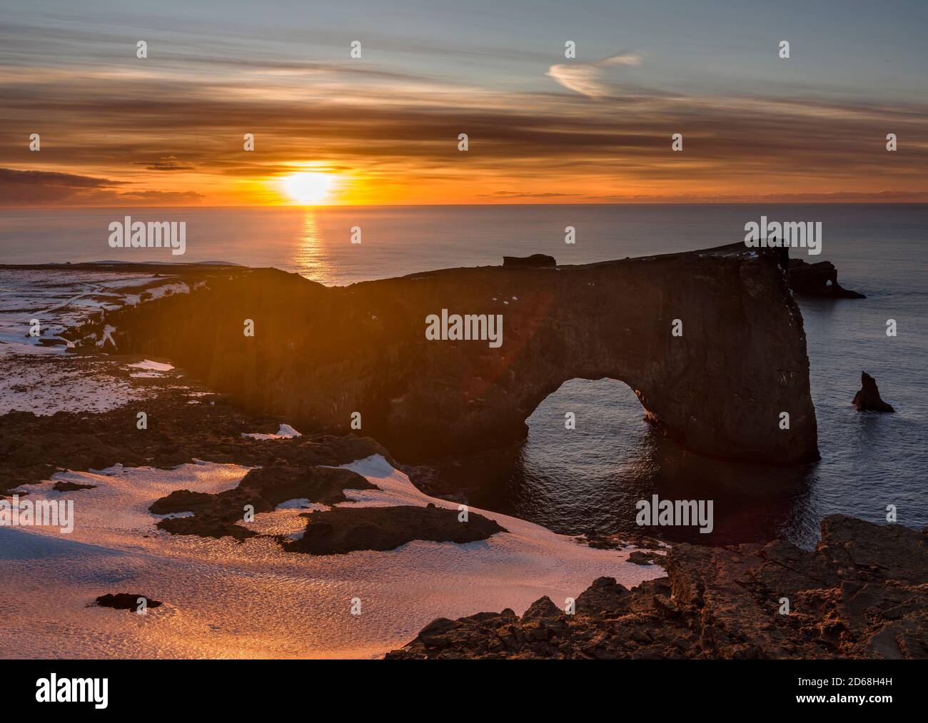 The natural sea arch at cape Dyrholaey. Coast of the North Atlantic ...