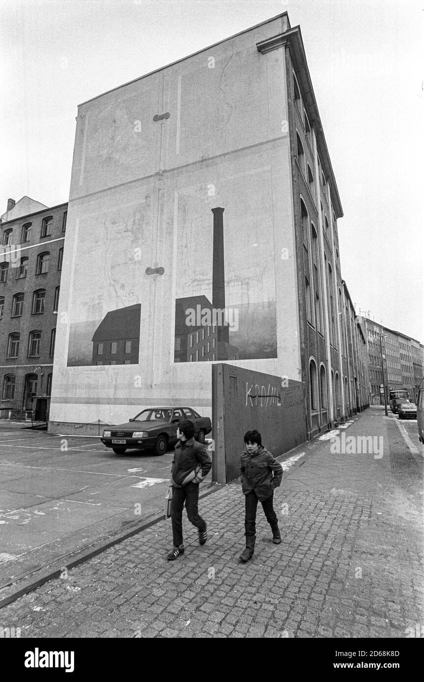Guys walking down the street (West Berlin Stock Photo - Alamy