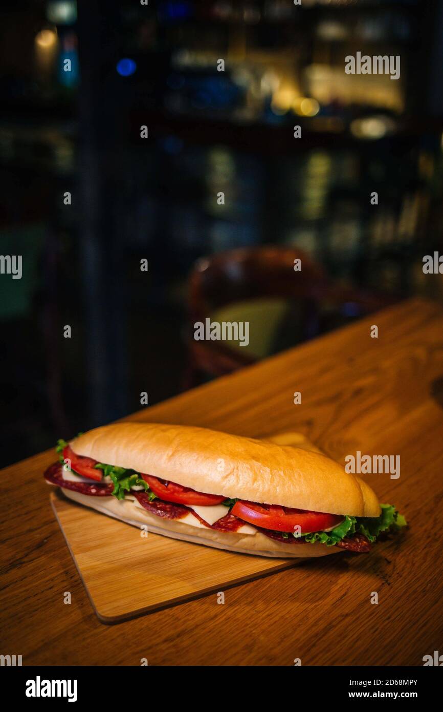 Vertical shot of a delicious sandwich on the table Stock Photo - Alamy